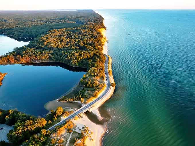 Where two worlds meet: Duck Lake State Park's stunning aerial view showcases nature's perfect marriage of inland lake and Great Lakes majesty.