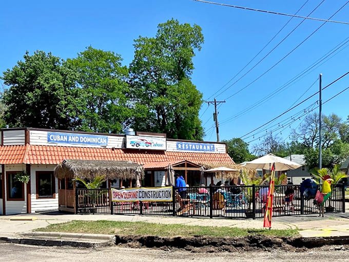 El Cubano's charming exterior promises a tropical escape with its orange-tiled roof and thatched patio – Minnesota's own little Havana hideaway.