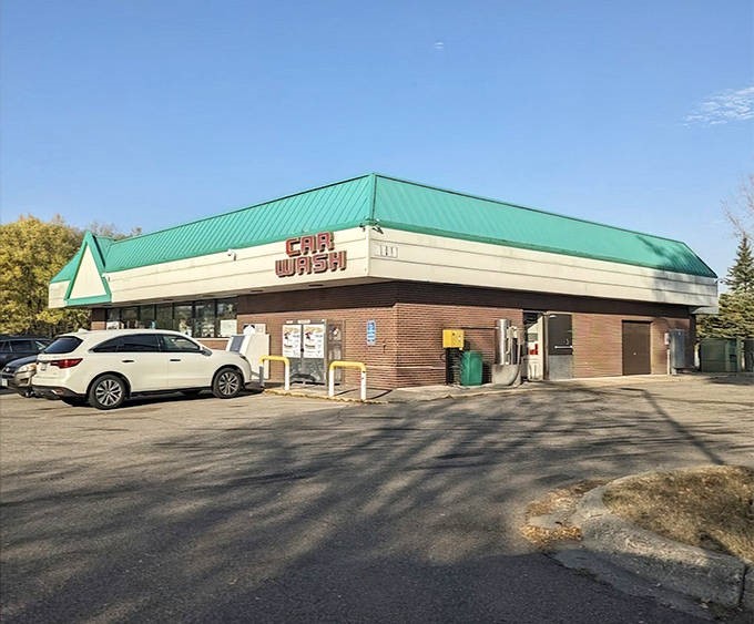 
Where culinary magic meets mundane errands &ndash; this unassuming car wash exterior hides Minnesota's taco paradise behind its green-roofed fa&ccedil;ade.