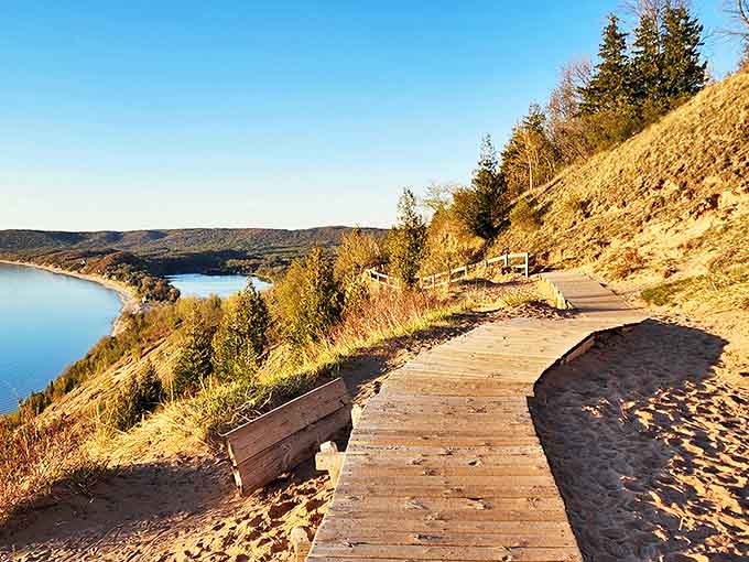 Golden hour meets golden dunes in this boardwalk journey where every step forward feels like walking into a postcard that forgot to mention the view gets even better.