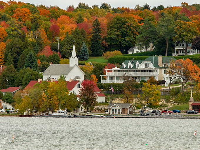 Ephraim's waterfront vista explodes with autumn colors, the white church steeple standing sentinel over this lakeside paradise.