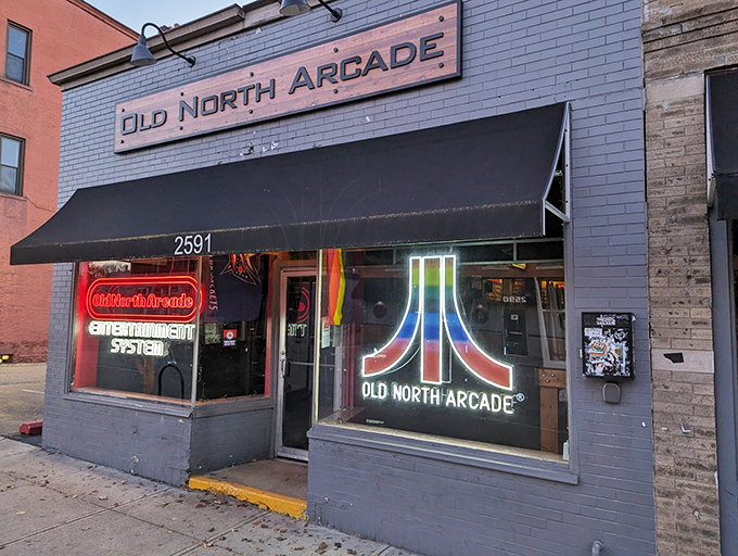 The unassuming exterior of Old North Arcade beckons with its neon promise of nostalgic gaming adventures and craft beverages.
