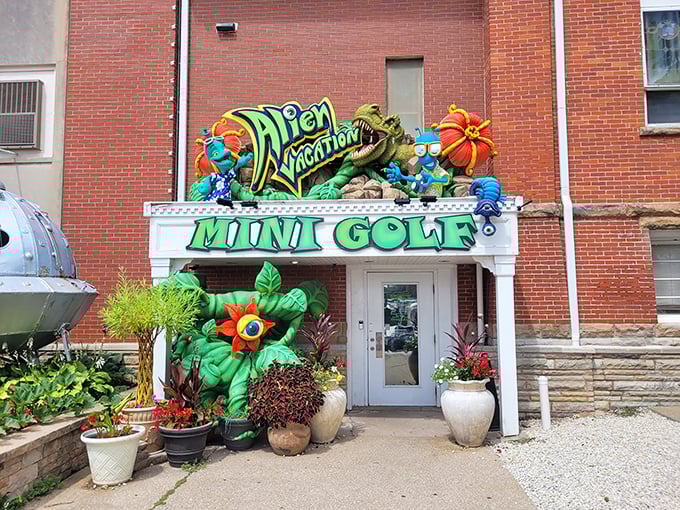 The unassuming brick exterior hides a portal to another dimension &ndash; complete with colorful aliens welcoming earthlings to their mini-golf paradise.