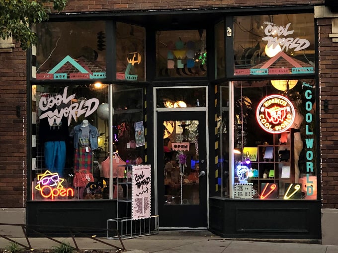 Neon dreams come alive at Cool World's storefront, where the glow of vintage signs beckons you into a time capsule of 90s nostalgia.