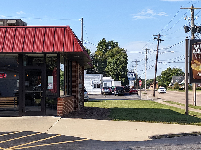 The iconic red-roofed exterior of Kruta Bakery stands like a beacon of sweetness on St. Louis Road, promising delicious treasures within.