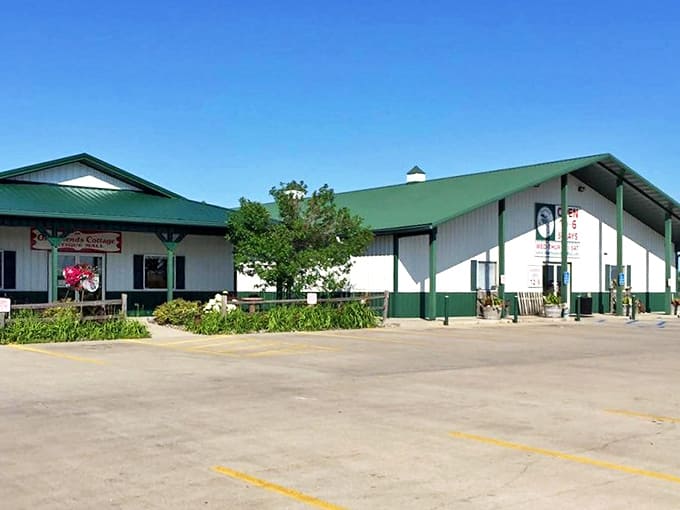 The unassuming exterior of Moorhead Antique Mall hides a wonderland of treasures within its green-trimmed walls, like a book you can't judge by its cover.