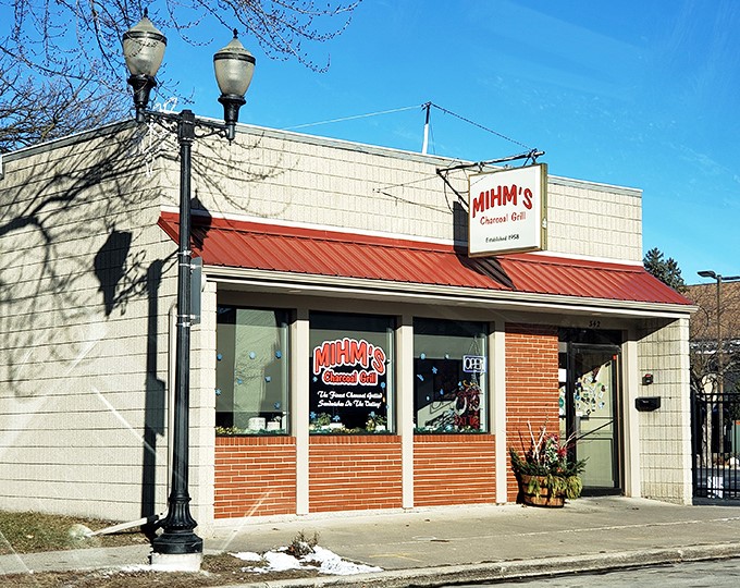 Mihm's exterior welcomes you with its vintage charm and red awning &ndash; a humble facade hiding burger greatness within.