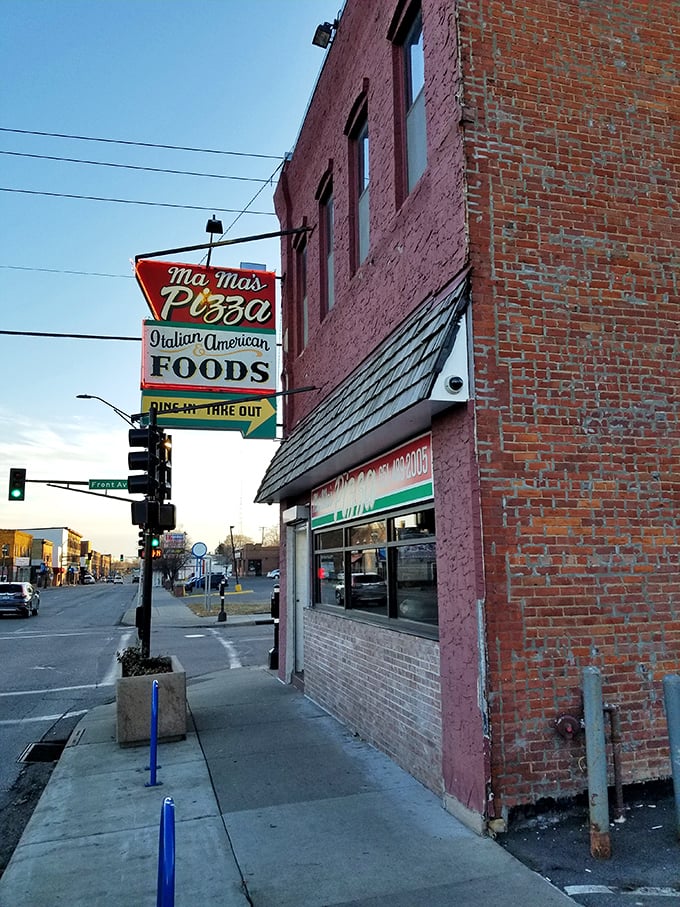 The iconic neon sign beckons hungry patrons like a beacon of hope for the pizza-deprived soul.