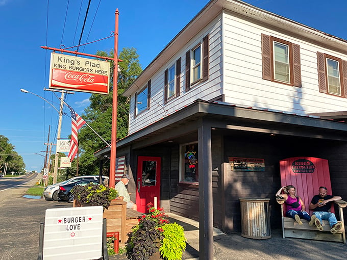 The iconic King's Place exterior beckons hungry travelers with its vintage Coca-Cola sign and promise of burger perfection.
