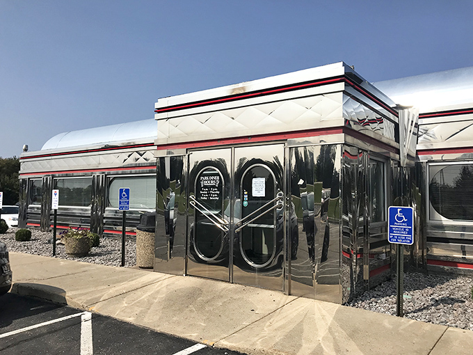 Gleaming like a chrome time machine, Park Diner's retro exterior promises a journey back to when food was honest and calories didn't count on Tuesdays.