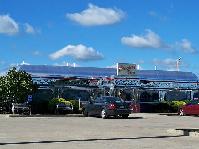 Gleaming like a chrome time machine under Ohio skies, Cruisers Diner's iconic exterior promises nostalgic delights before you even step inside.