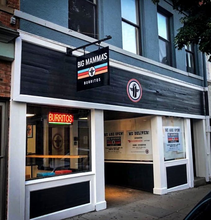 Exterior: The blue storefront with its iconic sign beckons hungry patrons like a lighthouse for the famished. No fancy frills, just burrito thrills.