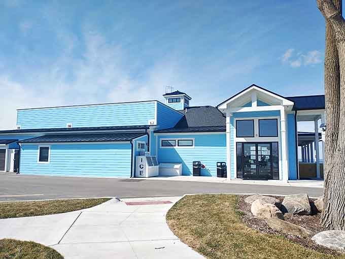 A slice of Caribbean paradise on Michigan shores &ndash; Cabana Blue's striking azure exterior promises coastal vibes before you even step inside.