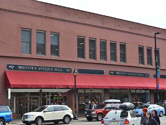 The iconic brick fa&ccedil;ade of Midtown Antique Mall welcomes treasure hunters with its distinctive red awnings &ndash; a modest exterior that belies the wonderland within.