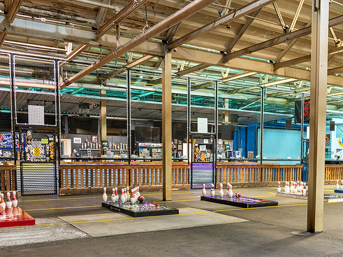 The Fowling Warehouse entrance beckons with its industrial charm &ndash; where football meets bowling pins in a marriage that somehow works perfectly.