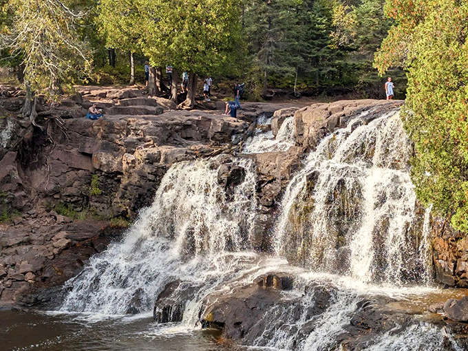 Fifth Falls cascades over ancient rock formations, creating nature's perfect soundtrack for hikers pausing to soak in Minnesota's wilderness magic.