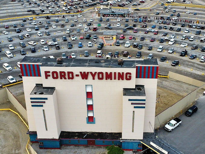 The iconic Ford-Wyoming sign stands tall against the Michigan sky, a beacon of cinematic nostalgia visible from miles away.
