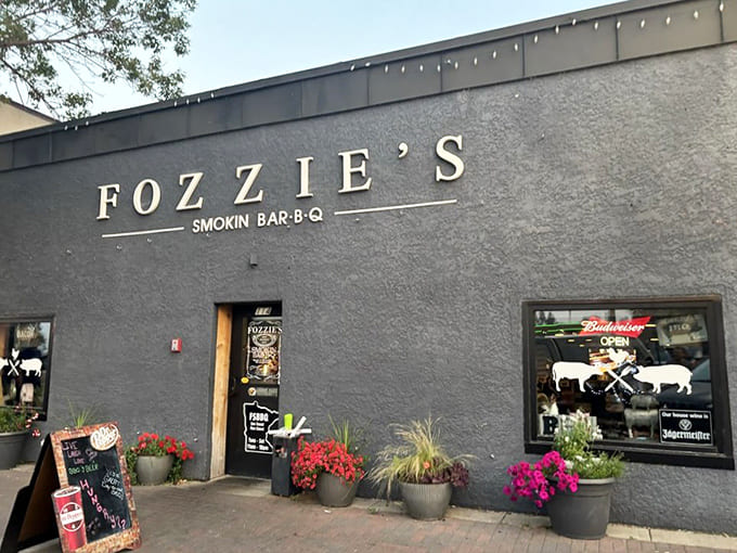 Exterior: Fozzie's unassuming gray exterior with vibrant flower pots welcomes barbecue pilgrims to this Bemidji meat sanctuary.