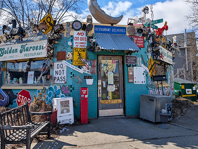 The turquoise wonderland of Golden Harvest, where street signs and bicycle parts create the most deliciously chaotic curb appeal in Lansing.