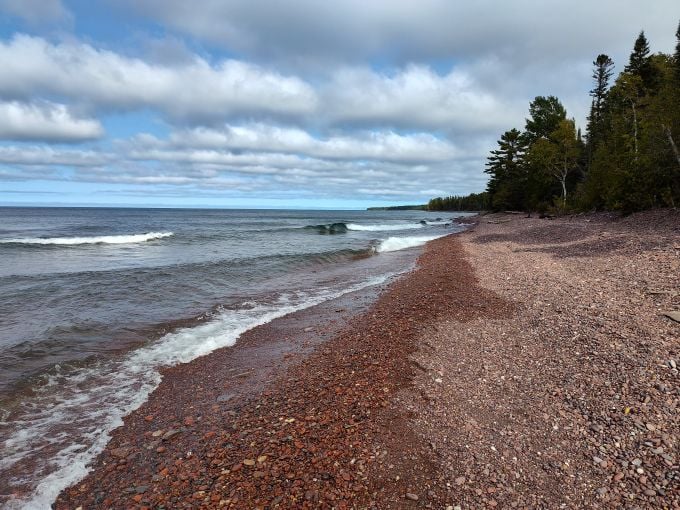 Gratiot River County Park: Where Lake Superior's mighty waters meet the shore, creating a rock collector's paradise that changes with every wave and season.