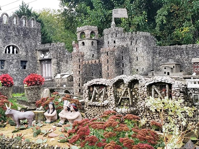 Stone castles and miniature buildings create a fairytale landscape at Hartman Rock Garden, where one man's vision transformed thousands of rocks into art.