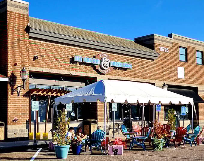 The welcoming brick fa&ccedil;ade of Honey & Mackie's promises sweet and savory treasures within &ndash; a beacon for flavor-seekers in Plymouth.