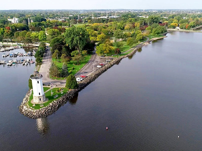 Aerial view of Lakeside Park showcasing the peninsula lighthouse and marina &ndash; Wisconsin's waterfront gem offers postcard-perfect views that rival coastal destinations.