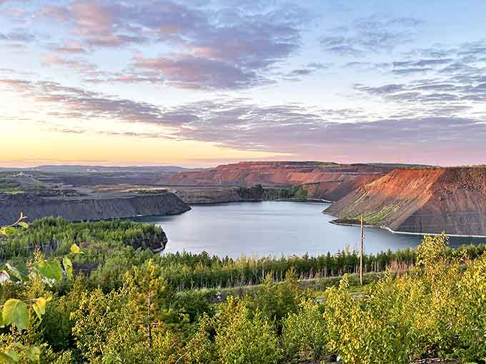 Sunset paints the mine lake golden at Leonidas Overlook, where Minnesota's industrial might meets natural splendor in perfect harmony.