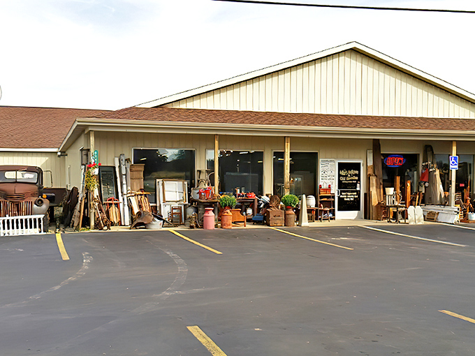 The unassuming exterior of Livingston Antique Outlet hides a wonderland of historical treasures within its walls, like a book you can't judge by its cover.