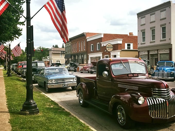 Milan, Ohio: Where vintage automobiles line streets adorned with American flags, creating a living museum of Americana at its finest.