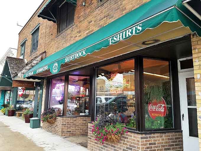 The iconic green awning and vintage storefront of Minnesoda Fountain beckons with promises of sweet nostalgia and even sweeter treats.