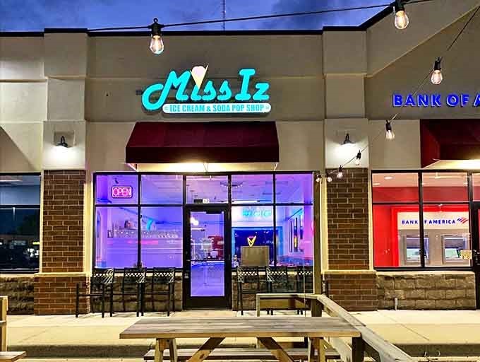 The neon glow of Miss Iz beckons like a lighthouse for sweet-toothed travelers, promising retro delights inside this Ramsey treasure.