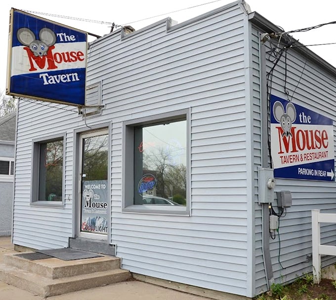 The Mouse Tavern's iconic blue exterior and cheerful rodent mascot have been welcoming hungry Beloit visitors for decades &ndash; a humble facade hiding culinary treasures within.