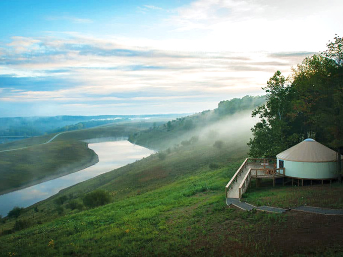 Nomad Ridge at The Wilds offers luxury yurts perched dramatically above the landscape, where morning mist creates a dreamlike safari experience.