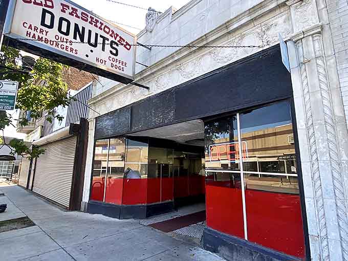 The iconic storefront beckons with its vintage sign, promising old-school delights that time forgot but taste buds remember forever.