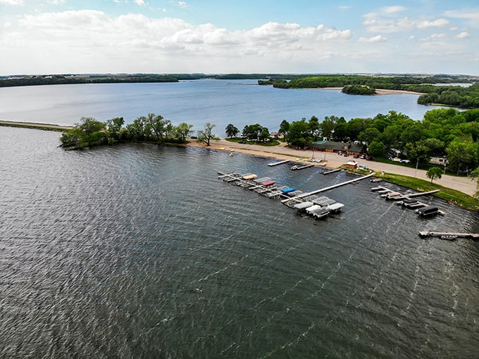 Aerial view of Otter Tail County's marina, where boats line up like eager puppies waiting to play fetch on the vast lake playground.