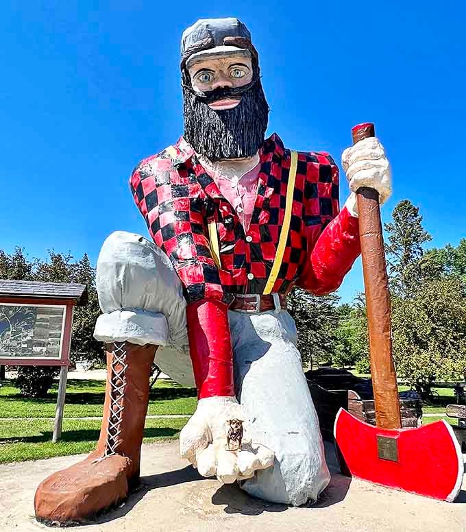 Standing tall against the Minnesota sky, this 25-foot lumberjack welcomes visitors with an outstretched hand and legendary presence.