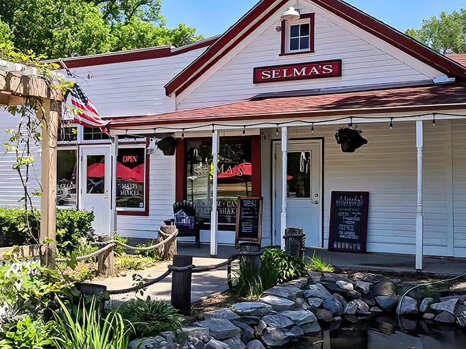 A storybook come to life – Selma's white clapboard exterior with cherry-red trim beckons ice cream lovers like a sweet mirage in Afton.