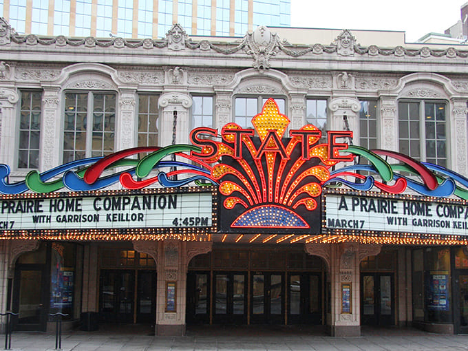 The State Theatre's dazzling marquee lights up Hennepin Avenue like a beacon of entertainment, promising magical nights since the Roaring '20s.
