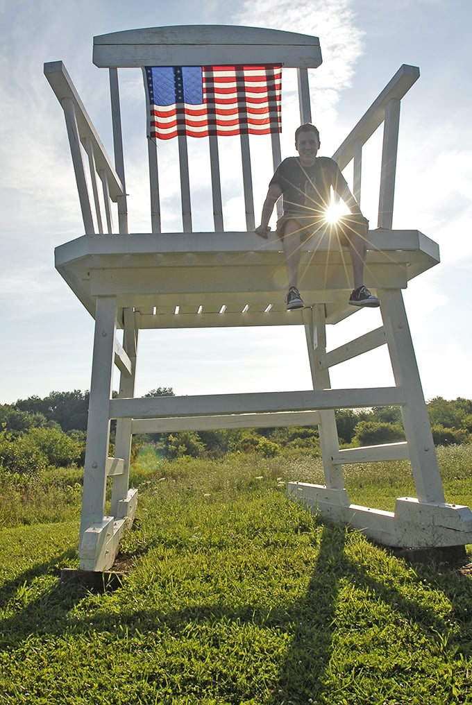 The Big Rocking Chair: A towering white monument to whimsy that makes roadtrippers slam on brakes and reach for cameras in delighted disbelief.