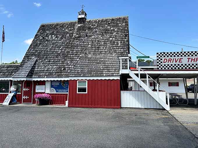 That red barn-style building with the checkered racing flag isn't fooling anyone&mdash;this is where serious cheese curd devotees come to worship.