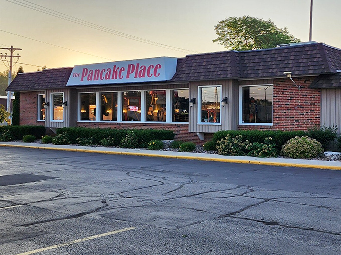The Pancake Place exterior welcomes hungry visitors with its classic diner charm &ndash; a breakfast beacon in Green Bay's morning landscape.