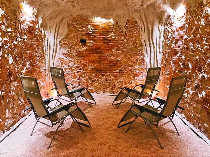 The Salt Cave Minnesota: Where amber-hued salt walls create a sanctuary that feels like stepping inside a giant, therapeutic geode.