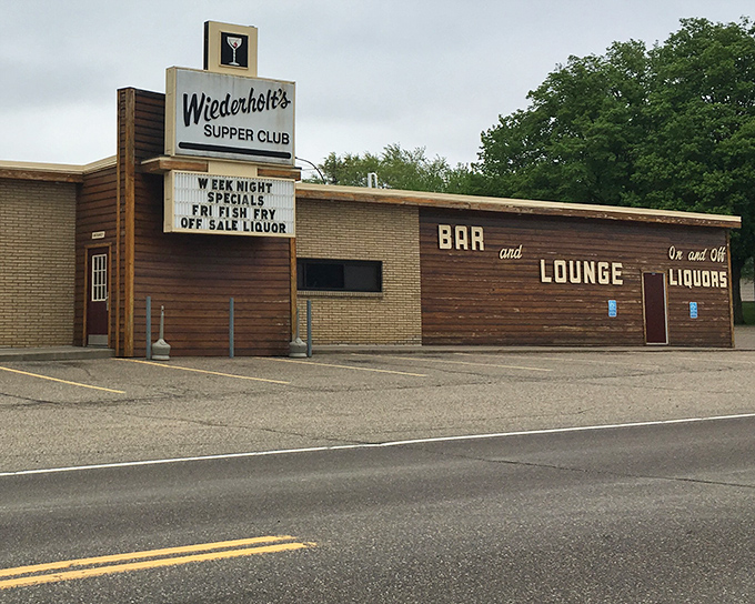 The iconic Wiederholt's exterior stands proudly along the roadside, its vintage sign promising weeknight specials and that legendary Friday fish fry.