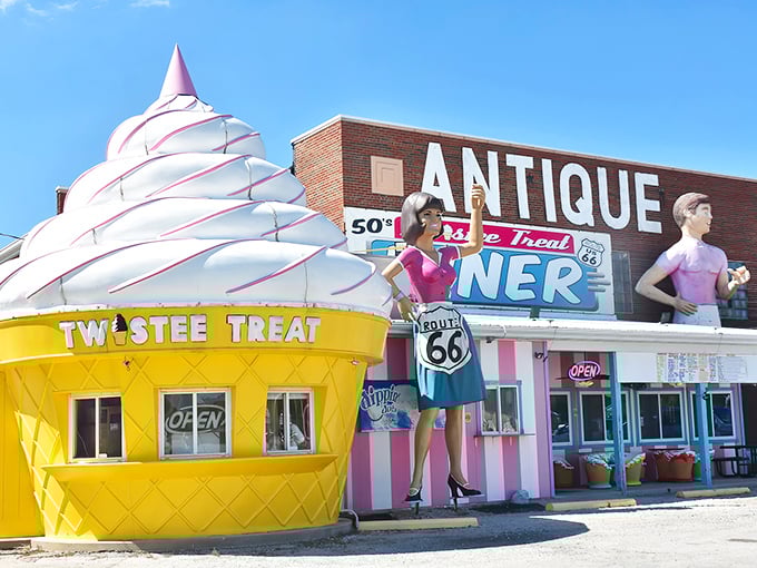 A roadside mirage that's gloriously real: The Pink Elephant Antique Mall's iconic ice cream cone building stands like a beacon of kitsch on Route 66.