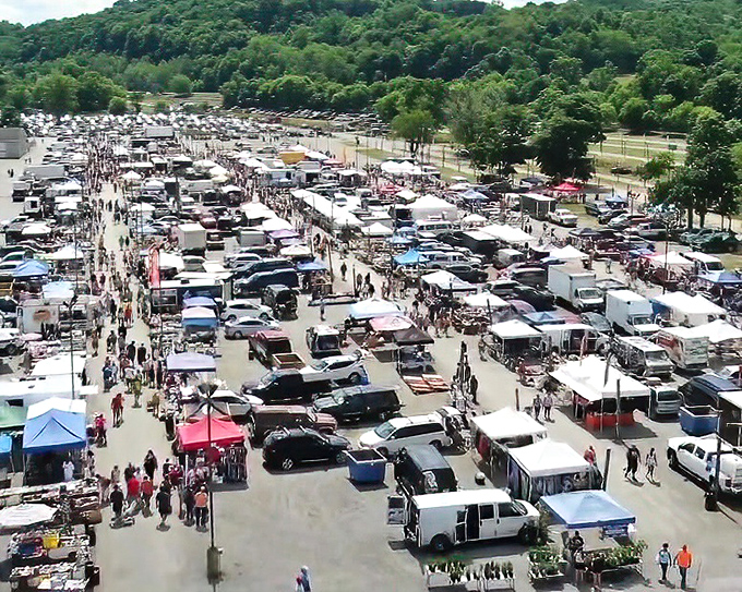 Aerial view of treasure-hunting paradise: thousands of vendors and shoppers create a bustling marketplace where one person's castoffs become another's treasures.