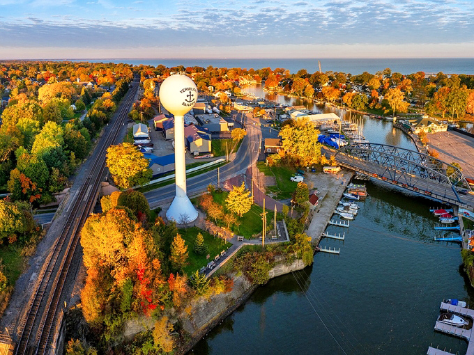 Vermilion's iconic water tower stands sentinel over a tapestry of autumn colors, where Lake Erie meets small-town charm.