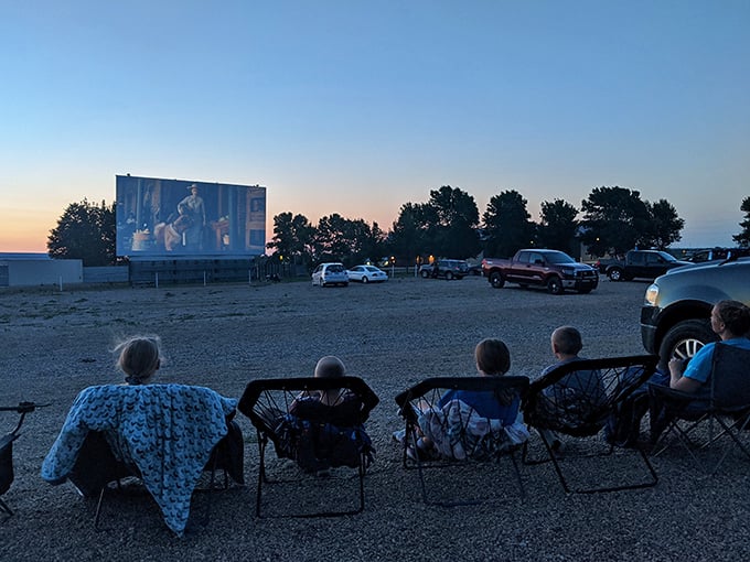 Dusk settles over the Verne Drive-In as moviegoers settle in for an evening of big-screen magic under Minnesota's expansive sky.