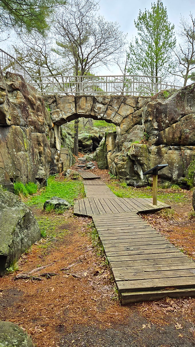 Ancient stone meets modern footsteps on the Walter Mondale Trail, where billion-year-old geology creates natural archways for curious explorers.