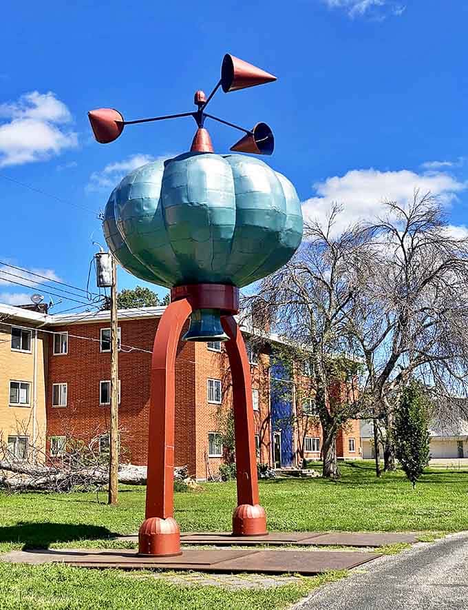 The welcoming sight to Western Sculpture Park stands proudly against a backdrop of artistic treasures and homes, inviting curious souls to explore Saint Paul's outdoor gallery.